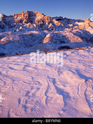 badland formations and snow, Badlands National Park, South Dakota Stock ...