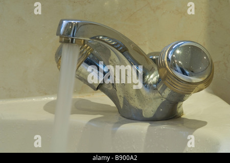 Running Tap water wastage Stock Photo - Alamy