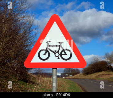 Cycle route ahead warning sign with a blue sky Stock Photo - Alamy
