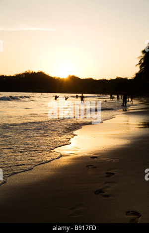 sunset at the beach in Samara in Costa Rica Stock Photo - Alamy