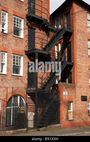 Fire Escape Stairs on the building. Construction with windows, walls of ...