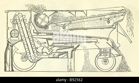Portable threshing machine used on the farm in Victorian times Stock ...