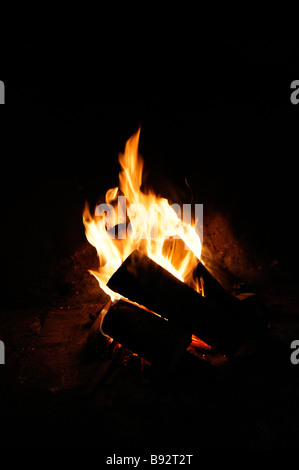 natural wood log fire embers glowing great for background or in solid ...
