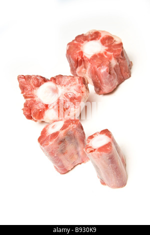 Ox tail chunks isolated on a white studio background Stock Photo - Alamy