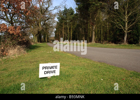 A hidden driveway road sign Stock Photo - Alamy