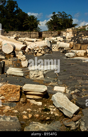 Earthquake toppled building columns debris ruins and upheaved steps ...