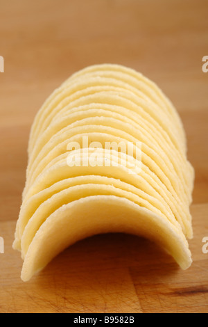Natural fat and salted potato chips heap Stock Photo - Alamy