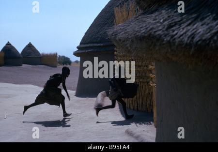 SUDAN North East Africa Shilluk tribes people gathered in a circle ...