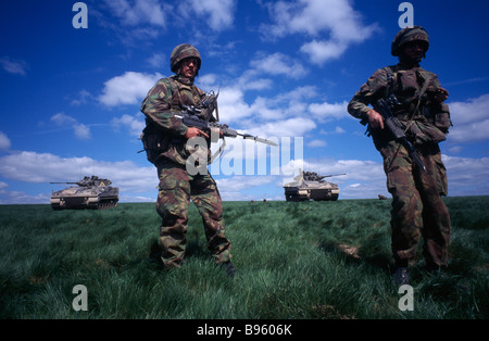 British army soldiers on a military tabbing exercise with 40Kg bergen ...