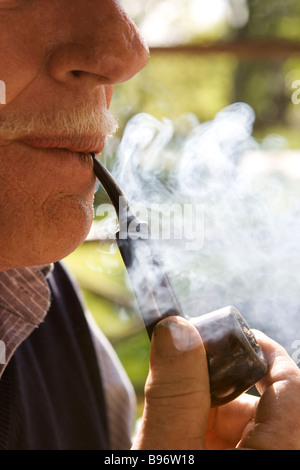 Man with idea smoking pipe Stock Photo - Alamy