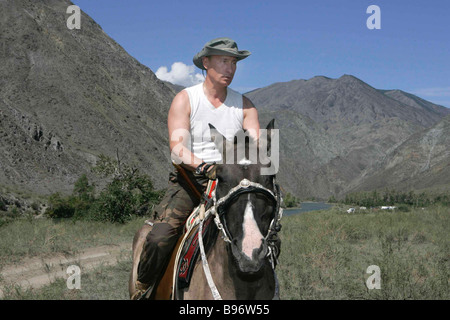 Russian President Vladimir Putin riding the horse at the spurs of the ...