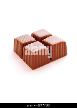 Brown chocolate cube shape candy isolated on white background Stock ...