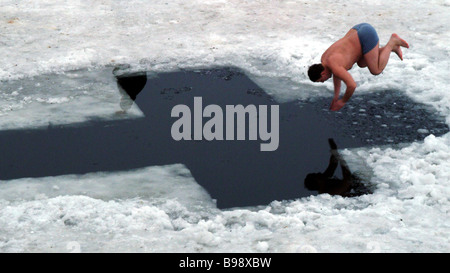 Epiphany ice hole diving in the Neva river in St Petersburg, Russia ...