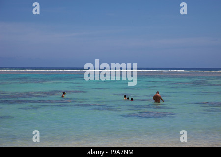 Polynesian Family fishing in the Pacific Ocean - Rarotonga, Cook Stock ...