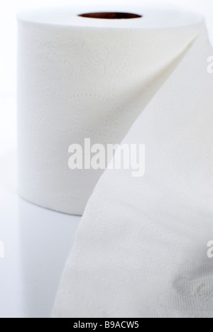 White toilet paper roll unrolling isolated on white with clipping path ...