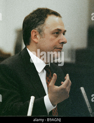 Russian Foreign Minister Andrei Kozyrev (L) and U.S. Secretary of Stock ...