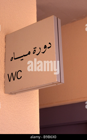 Toilet sign in English and Arabic Stock Photo - Alamy