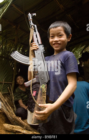 Soldier hiding AK-47 Stock Photo - Alamy