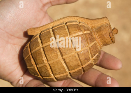 A wooden hand grenade where Bombs converted to other uses left over ...