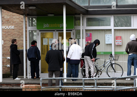 UNEMPLOYED QUEUEING JOB CENTRE PLUS FOR JOBS Stock Photo - Alamy