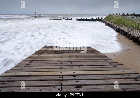 Walcott beach with rough sea and snow clouds approaching the north ...