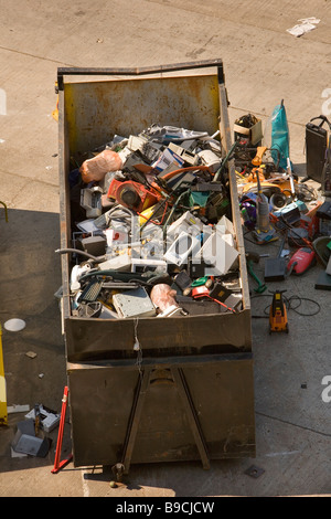 Waste bin full of electronics, e-waste and recycling concept Stock ...