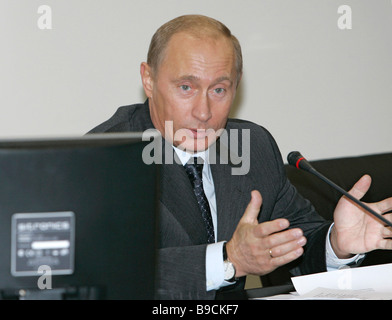 Russian President Vladimir Putin chairs a meeting with the permanent ...