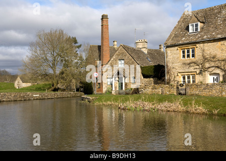 Watermill Water Mill at Lower Slaughter village on the River Coln with ...