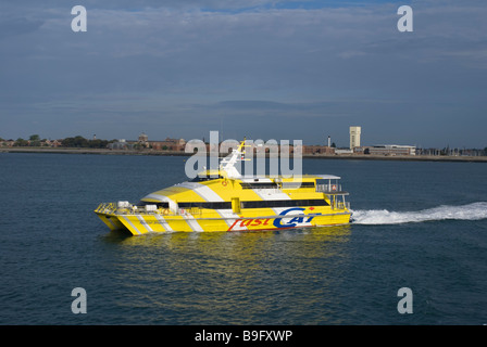 The Fast Cat ferry leaving Portsmouth harbour Stock Photo - Alamy