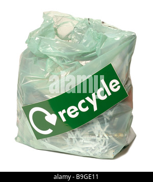 Bag with garbage and rubbish bin with logo of recycling at home Stock ...