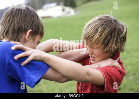 Meadow boys fights sidewards people 11-13 years children two childhood ...