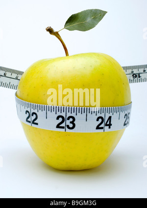 apple with a tape measure Stock Photo - Alamy