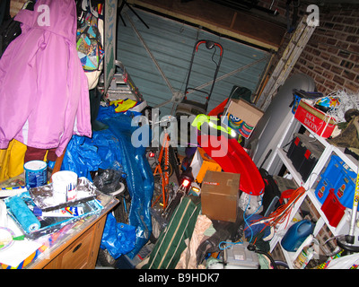 Messy domestic garage full of clutter Stock Photo - Alamy