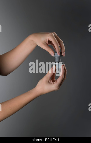 Close up of hand tightening a bolt using a ratchet socket wrench Stock ...