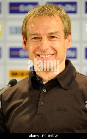 German coaches (L-R) Juergen Klinsmann (head coach), Joachim Loew ...