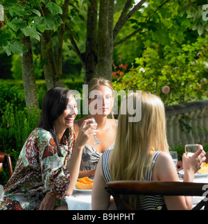 Couple sitting outside having lunch at a small Restaurant Stock Photo ...