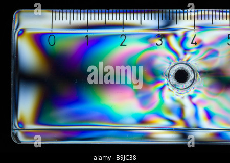 Close up of stress patterns in plastic set square. Cross polarized ...