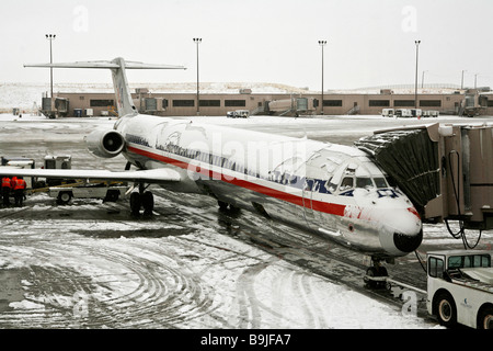 Airplane in bad weather, snow storm on snowy runway, Gardermoen Stock ...