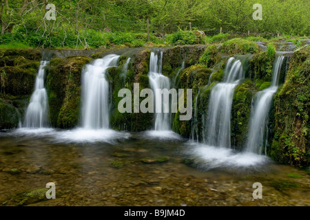 Small waterfalls in the Lathkill Dale National Nature Reserve in the ...