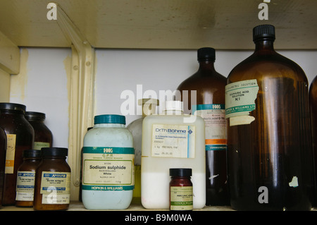 Sulphuric acid, laboratory bottle. The hazard label warns that this ...