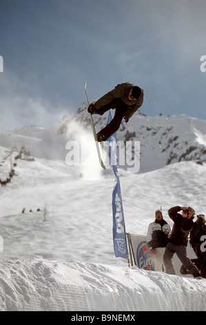 Snowboarder flying high in halfpipe Stock Photo - Alamy