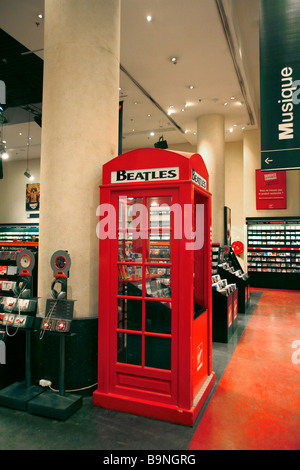 A red telephone booth in Paris, France Stock Photo - Alamy