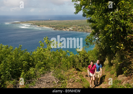 Hiker walks the Pali Trail, Kalaupapa National Historical Park ...