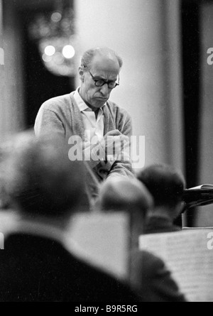 Conductor Yevgeny Mravinsky at the symphony orchestra performance Stock ...