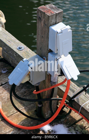 Power outlets at a marina Stock Photo - Alamy