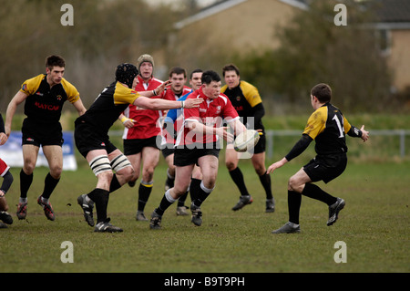Rugby player passing ball tackled by shark Stock Photo - Alamy