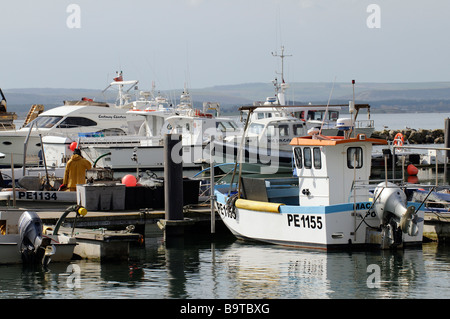 Port of Poole, southern England, UK. A deck cargo vessel underway and ...