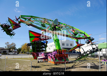Carnival rides and games on the midway at the Missouri state fair, USA ...