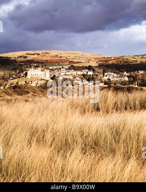 Town of Harlech, Wales. Harlech Castle gatehouse, with the Red Dragon ...