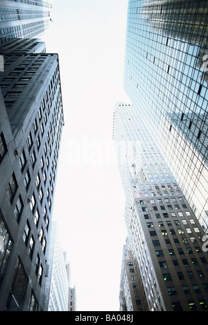 Low angle shot of high-rise modern buildings under a cloudy sky Stock ...